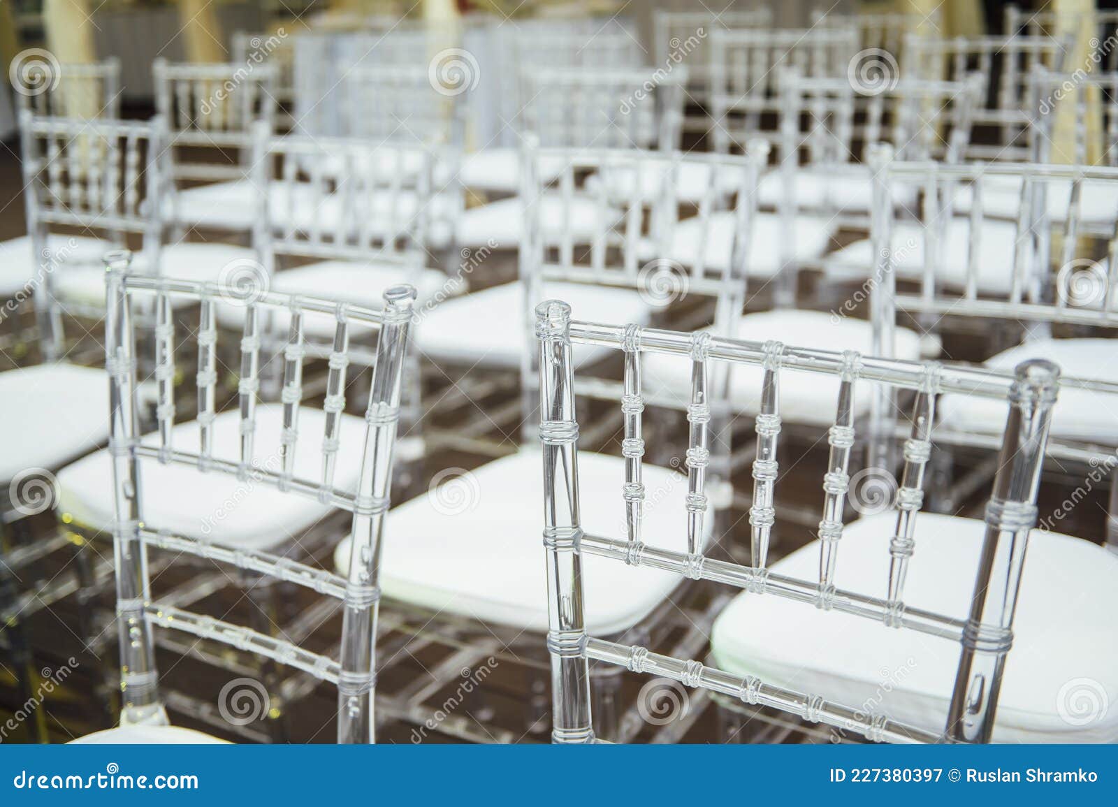 Glass Chairs Stand in a Row in a Beautiful Wedding Outing Ceremony ...