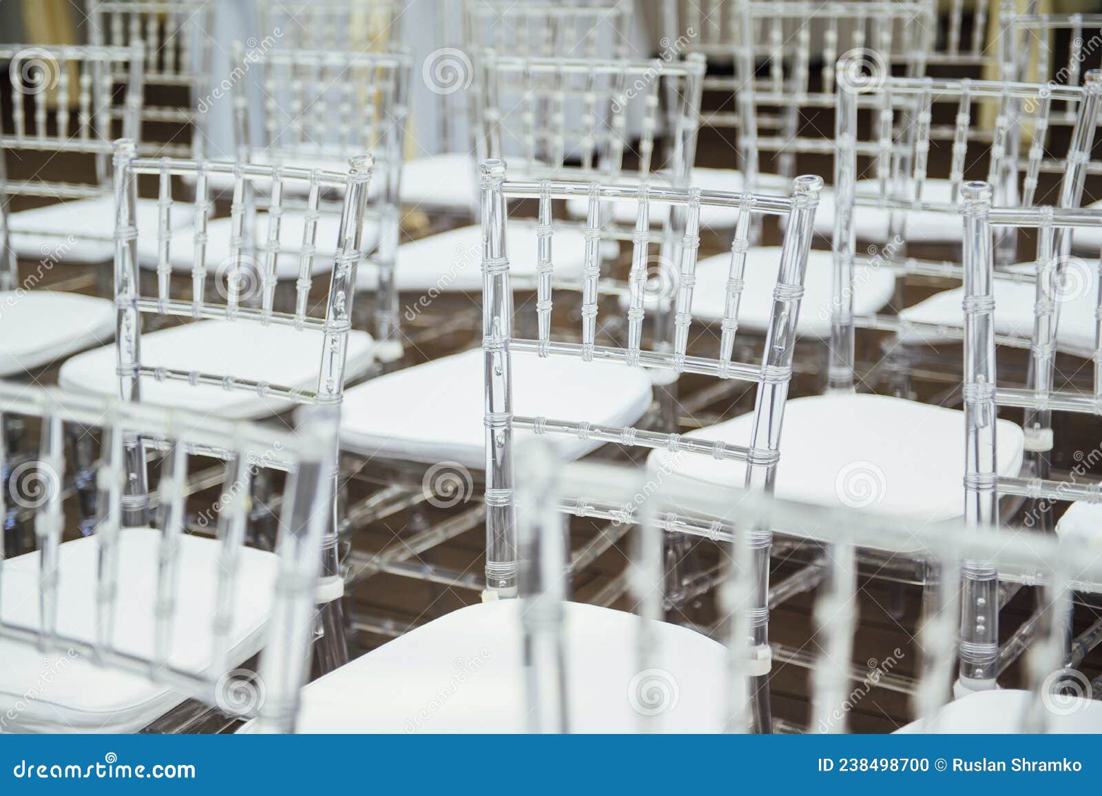 Glass Chairs Stand in a Row in a Beautiful Wedding Outing Ceremony ...