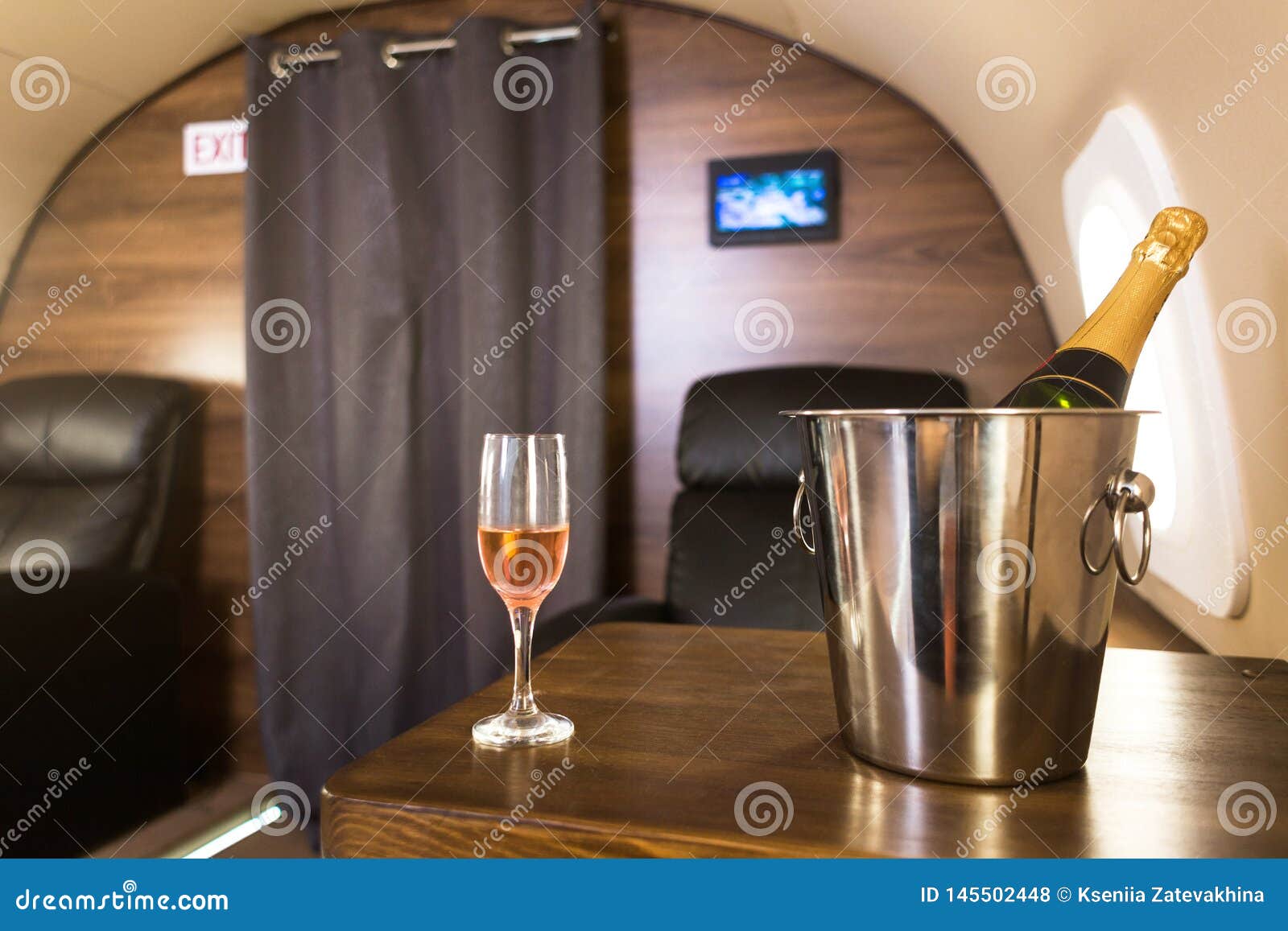 A Glass of Champagne in the Interior of a Private Jet. Flying First ...
