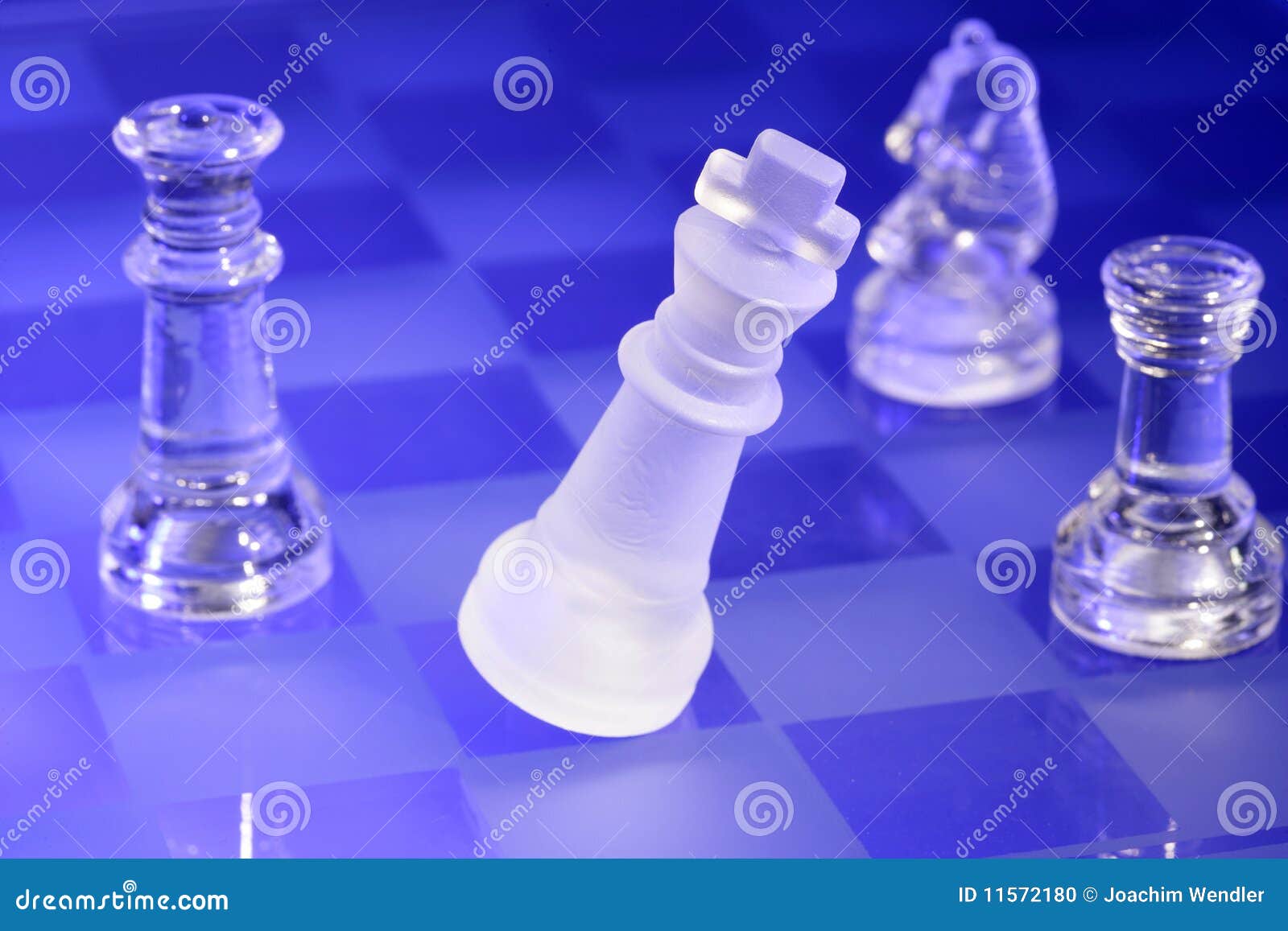 Glass Chessmen in Blue Light Stock Photo - Image of chessman, game ...