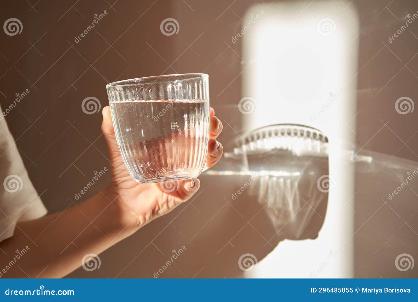 A Glass of Clean Drinking Water in the Morning Sun. Stock Image - Image ...