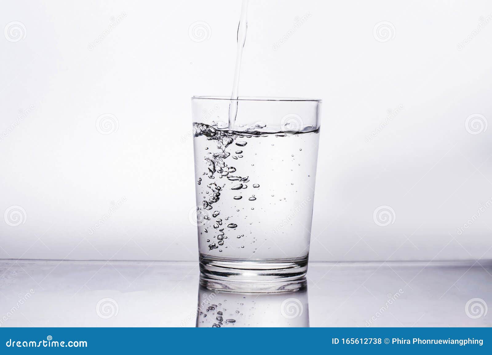 The Glass is Clean Drinking Water on a White Background Stock Photo ...