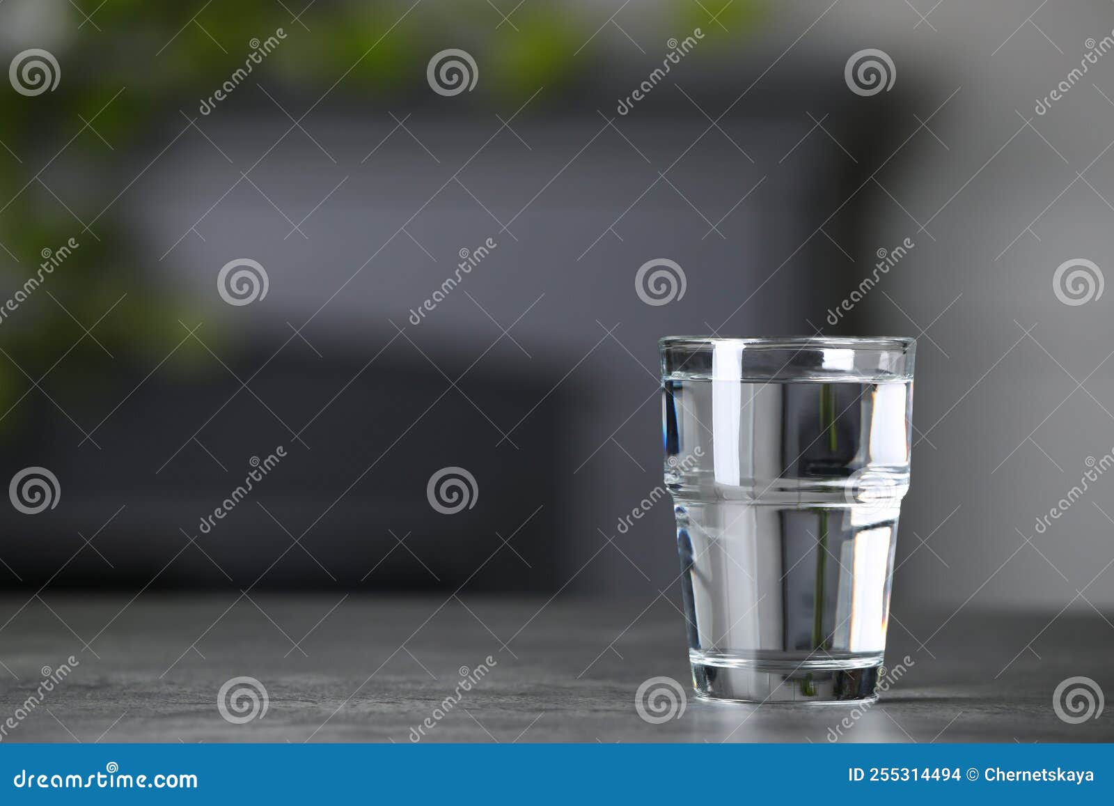 Glass of Clean Water on Grey Table Indoors, Space for Text Stock Photo ...