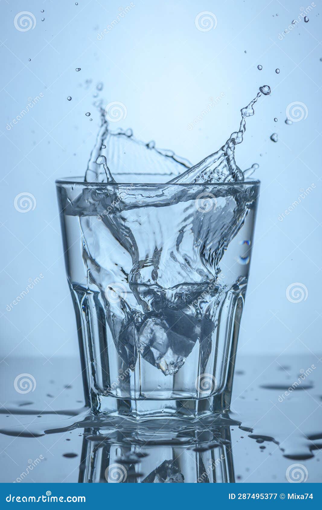 A Glass of Clean Water into Which an Ice Cube Was Thrown, Water ...