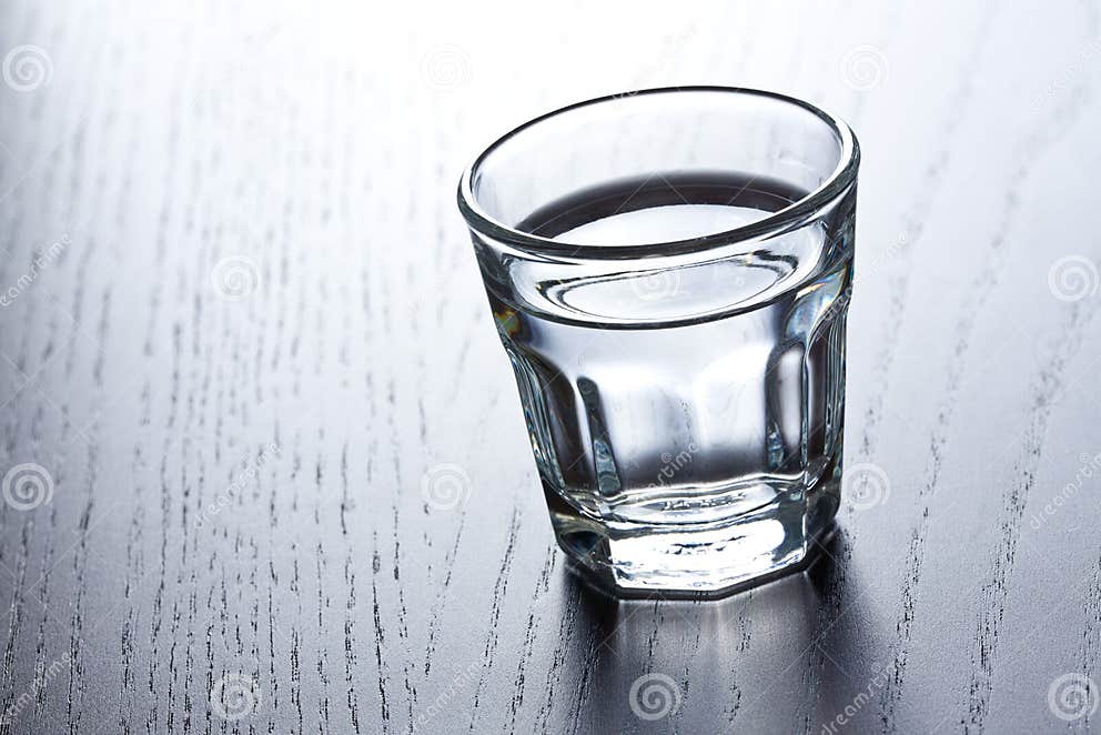 Glass of clear alcohol stock photo. Image of clean, club - 26645412