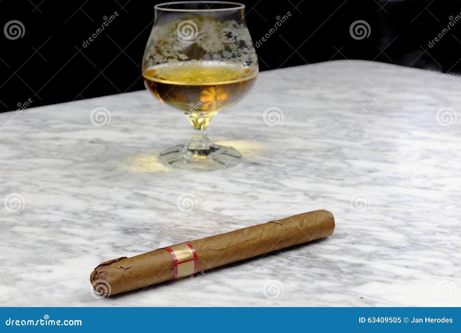 Glass of Cognac with a Cigar on a Marble Table Stock Image - Image of ...