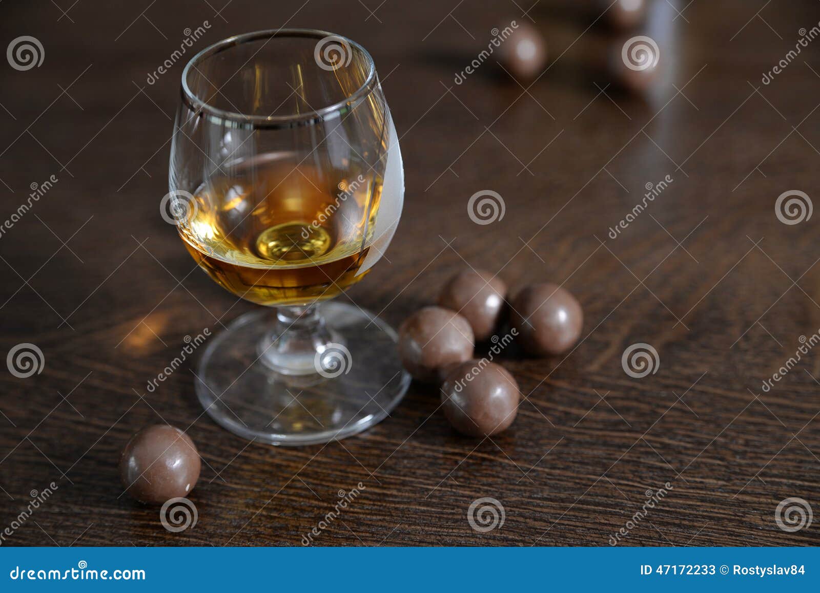A glass with cognac stock image. Image of single, whiskey - 47172233