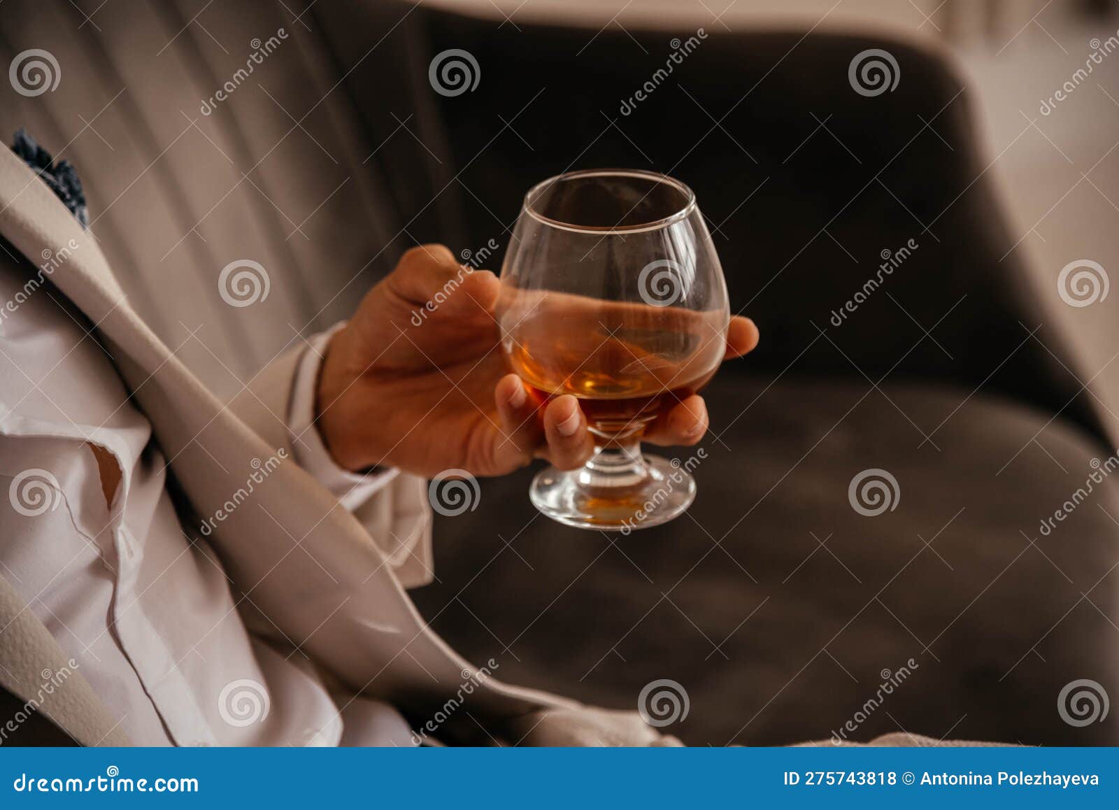 A Glass of Cognac in a Man S Hand Stock Photo - Image of spirit, cognac ...