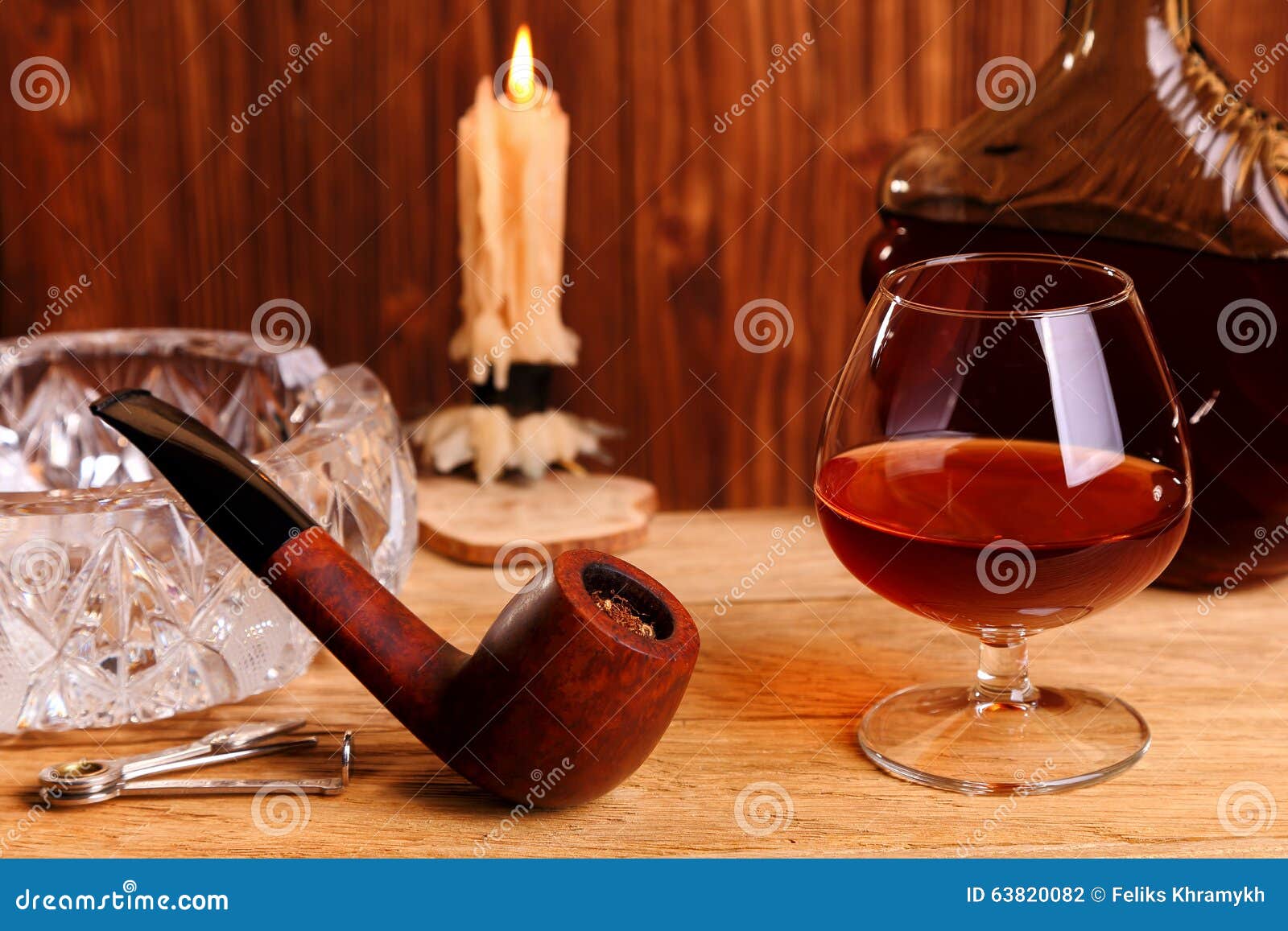 A Glass of Cognac and Smoking Pipe Stock Photo - Image of drink, cognac ...