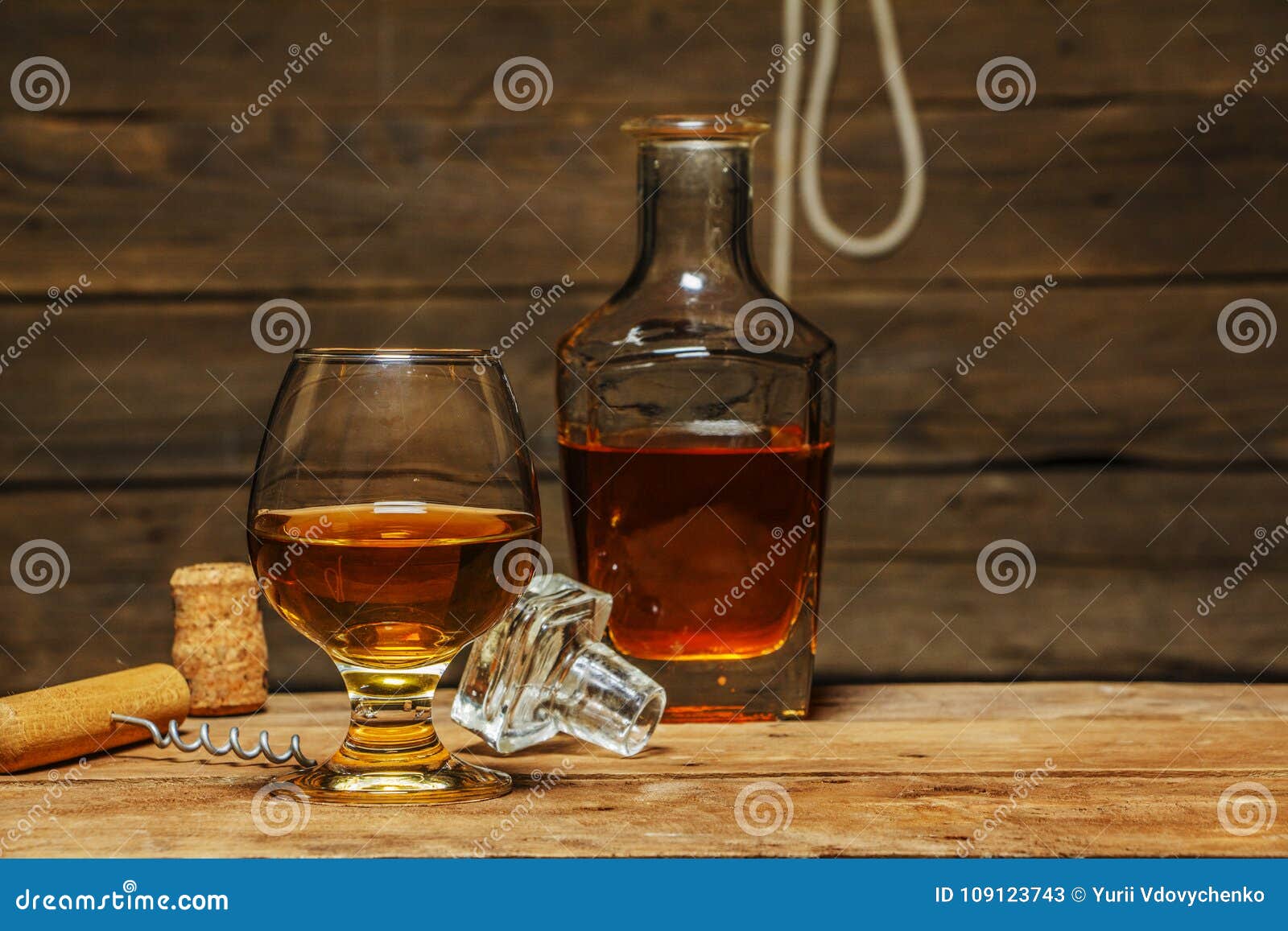 A Glass Of Cognac Or Whiskey On A Rustic Table With Chocolate Stock Image Image Of Delicious