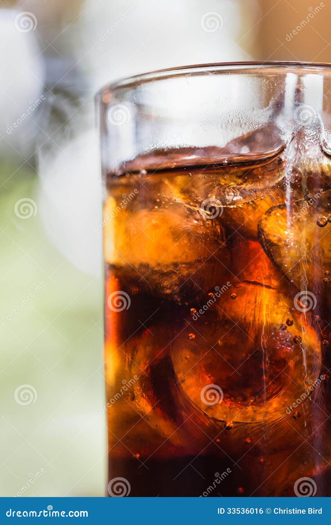 A glass of coke stock photo. Image of light, cocacola - 33536016