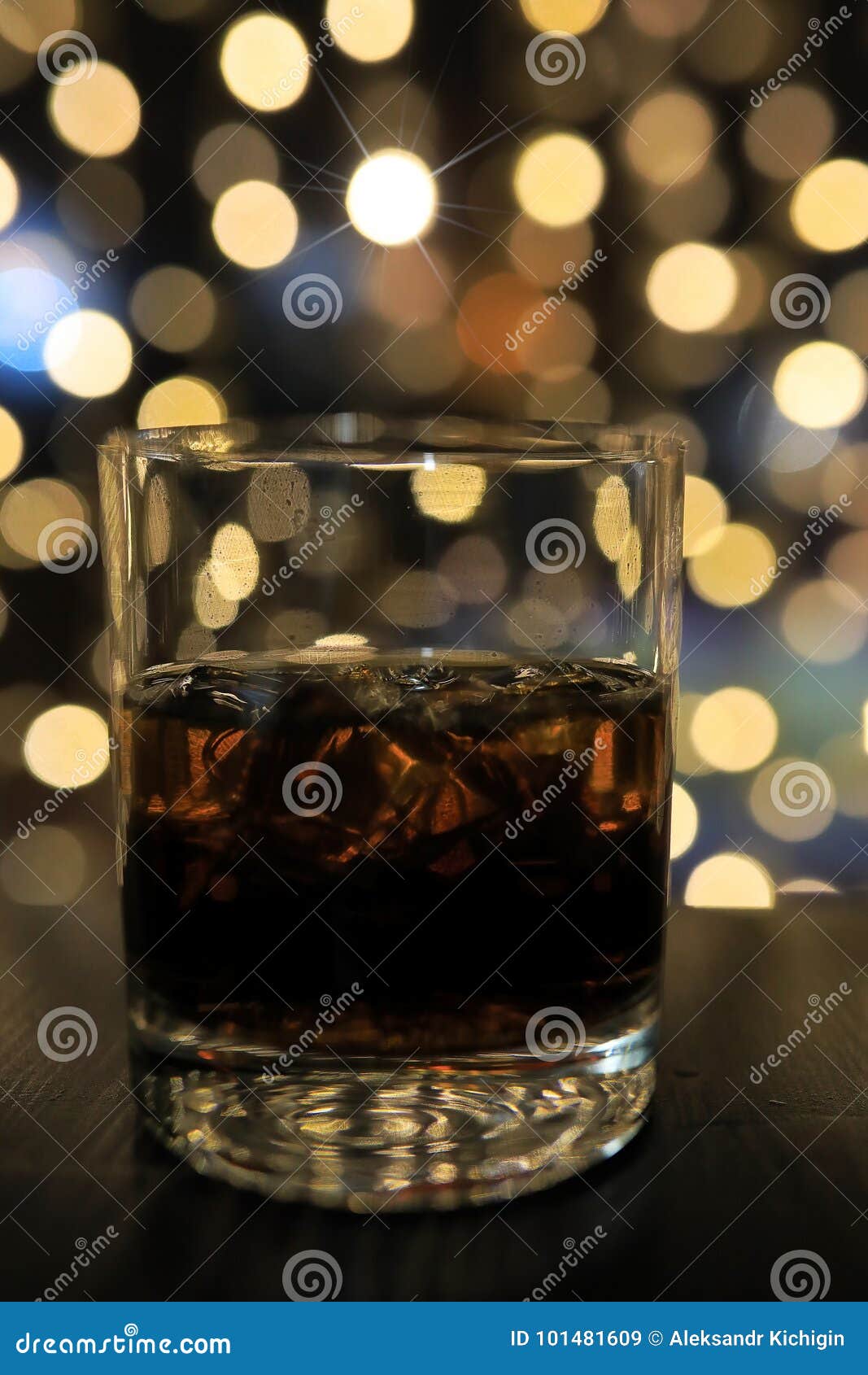 Glass of Cold Alcohol Drink with Ice on Table Stock Image - Image of ...