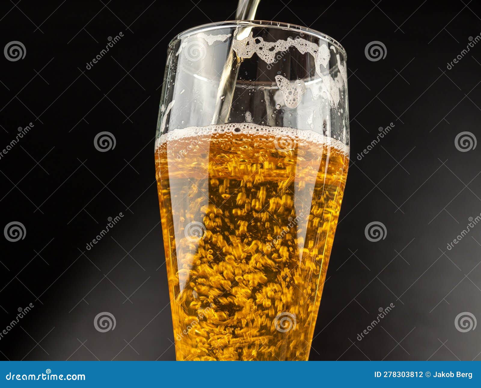 A Glass of Cold Beer on a Dark Background. Stock Photo - Image of ...
