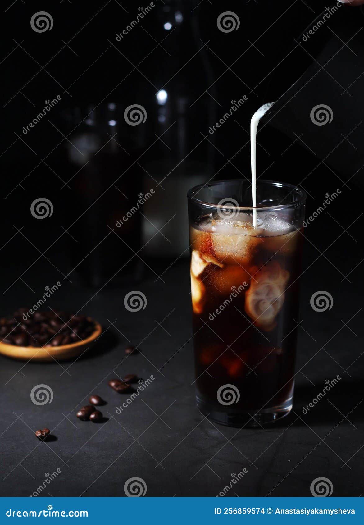 Cold Coffee with Ice in Low Key Stock Photo - Image of food, arabica ...