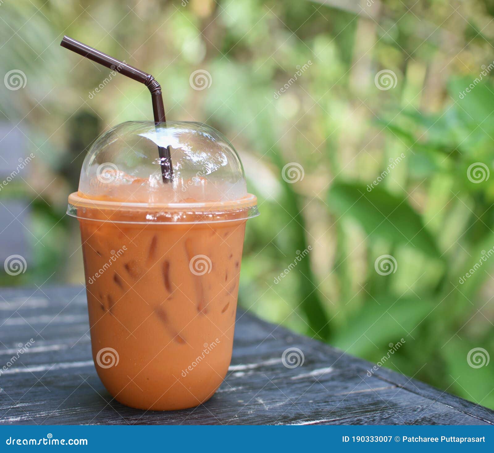 Glass of Cold Milk Tea is Set on a Wooden Stock Image - Image of wooden ...