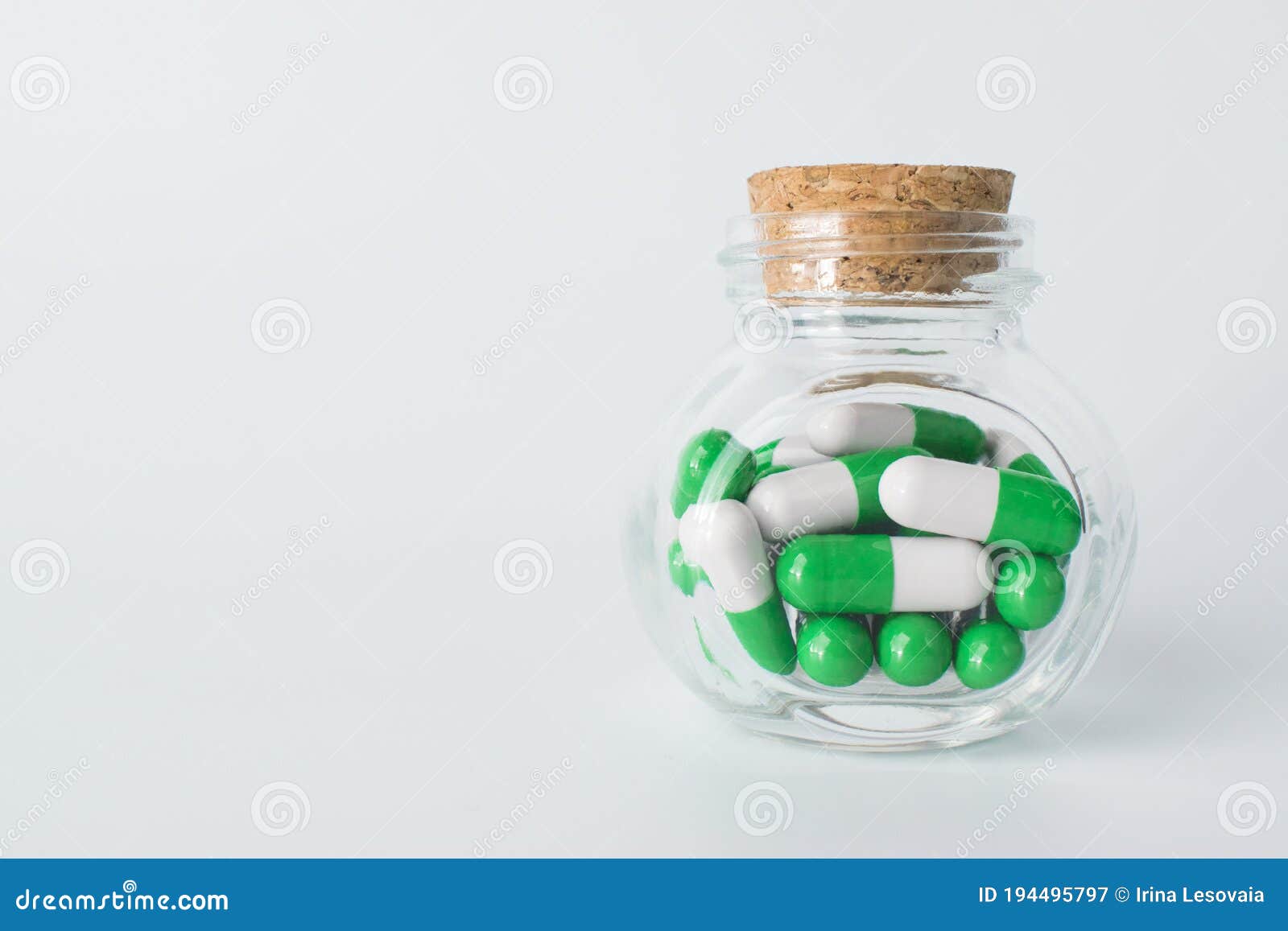 Glass Container with Capsules on a White Background with a Copy Space ...