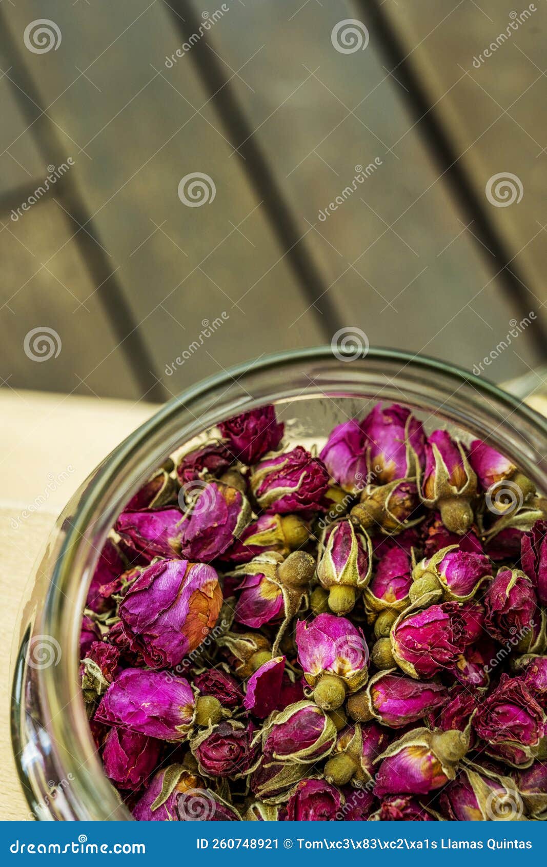 A Glass Container Filled with Dried Rose Buds To Make Tea Stock Image ...