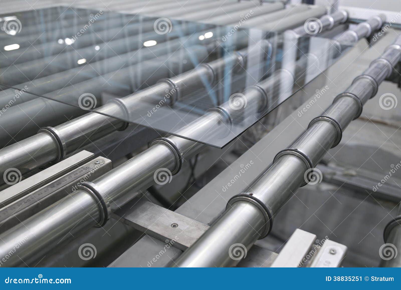 Glass conveyor line stock image. Image of mechanical - 38835251