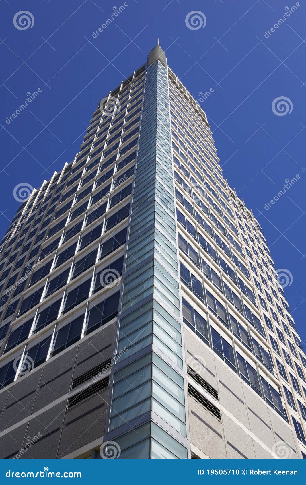 Glass cornered Skyscraper stock photo. Image of center - 19505718