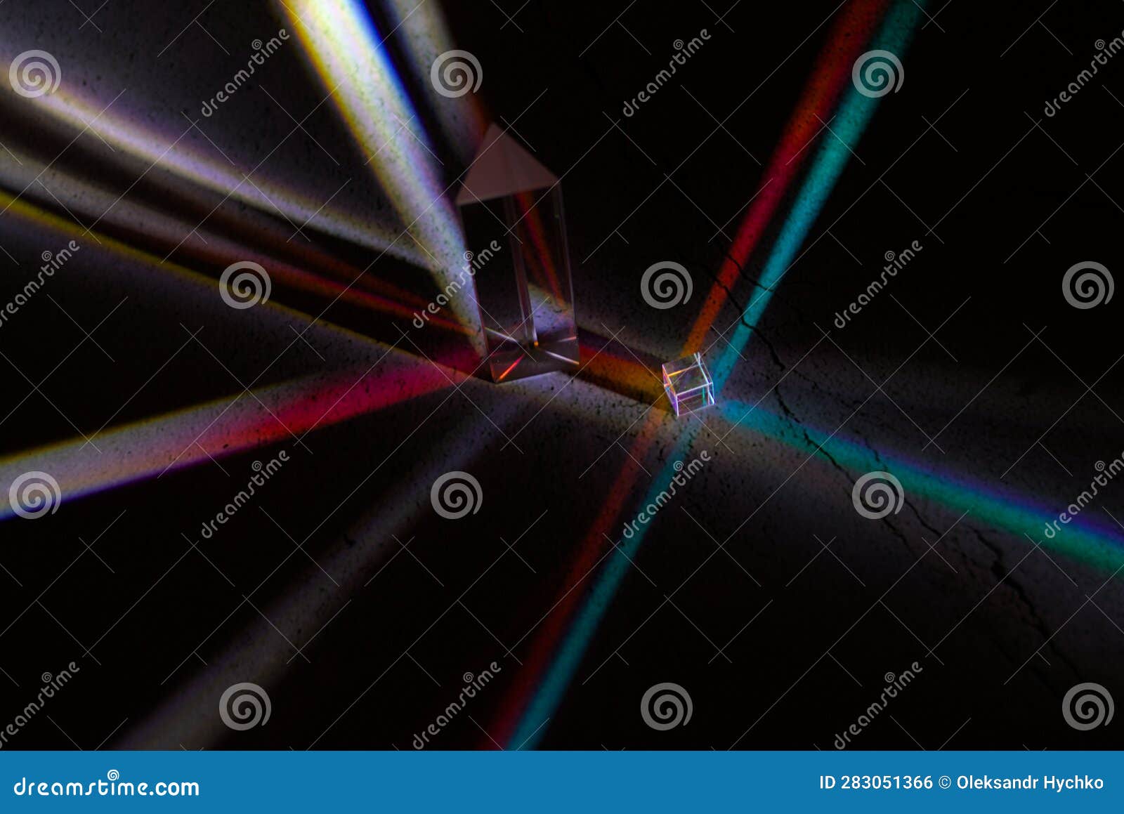 A Glass Cube and Triangular Prism Reflects Colors Stock Photo - Image ...