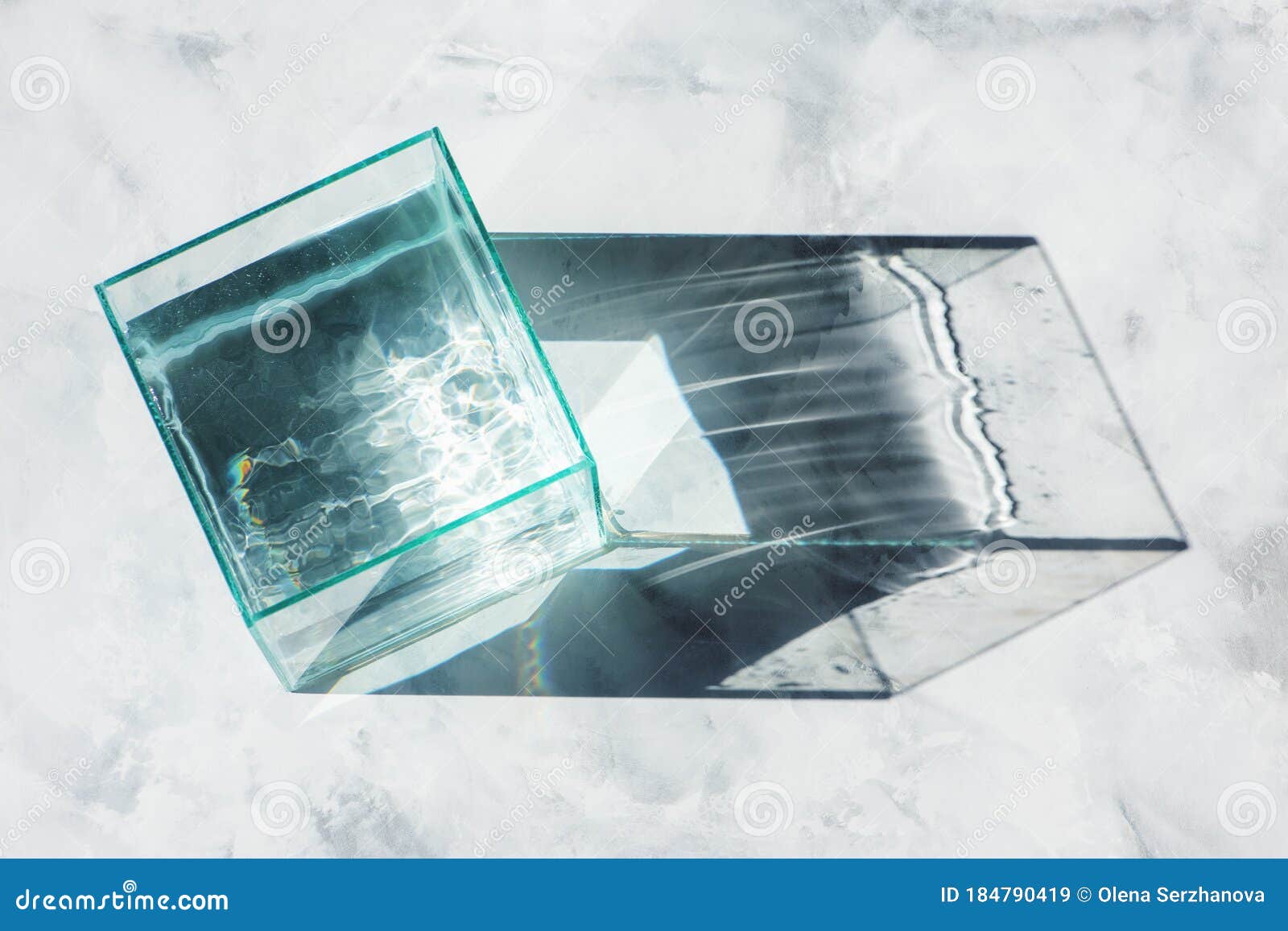 Glass cube with water. stock image. Image of container - 184790419