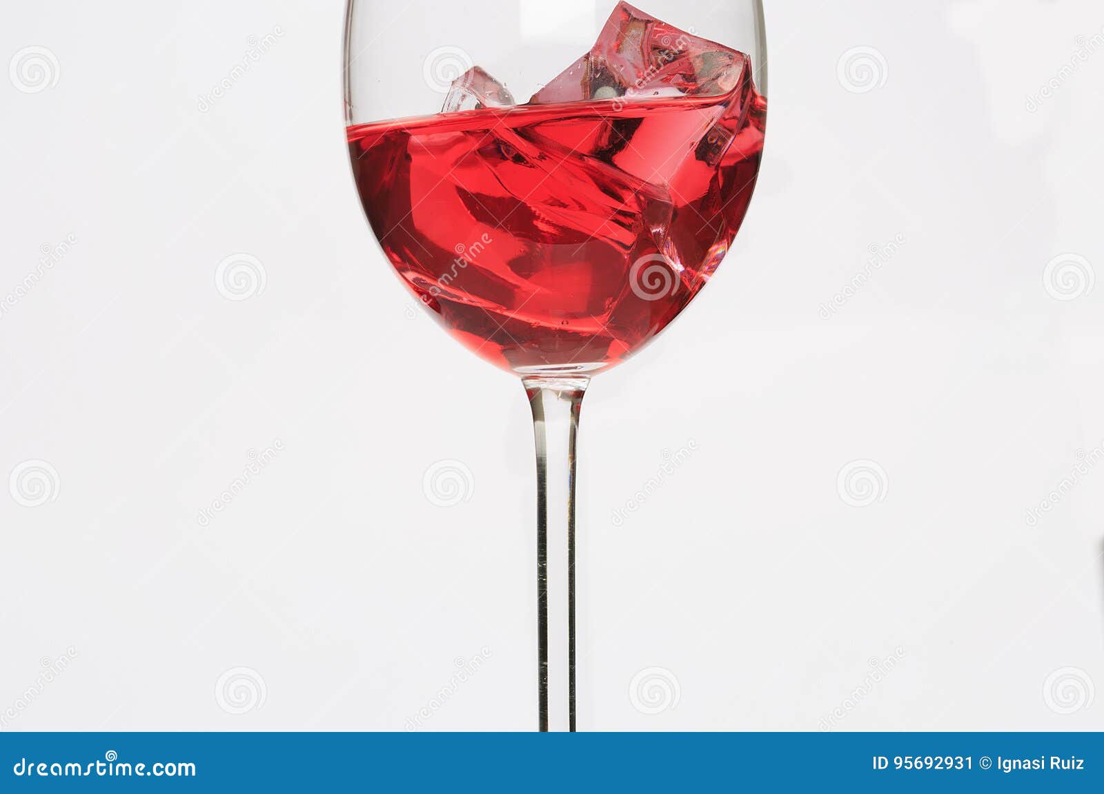 Glass Cup with Red Liquid and Ice Stock Image - Image of flow, liquor ...