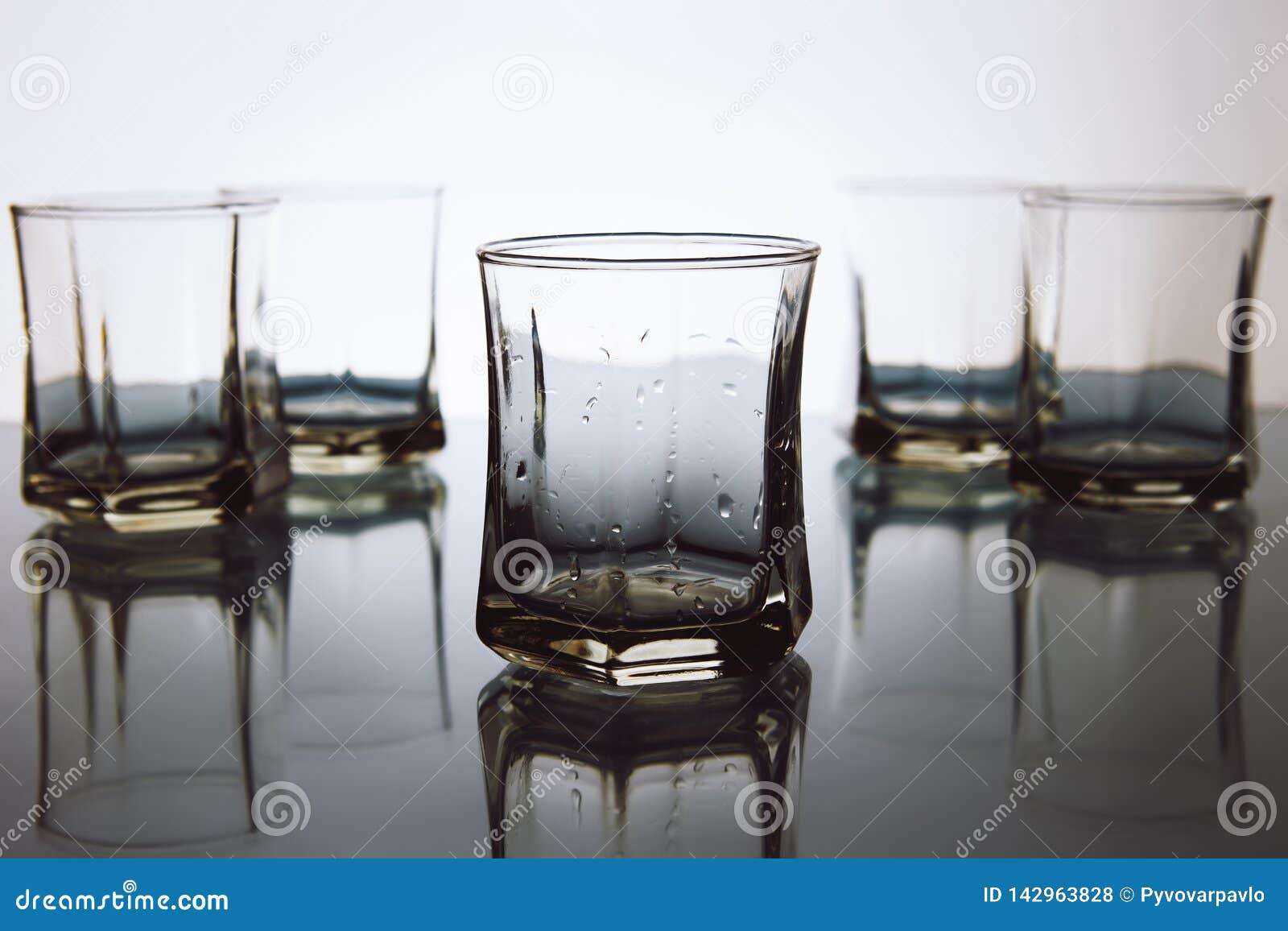 Glass cups stock photo. Image of party, shiny, mysterious - 142963828