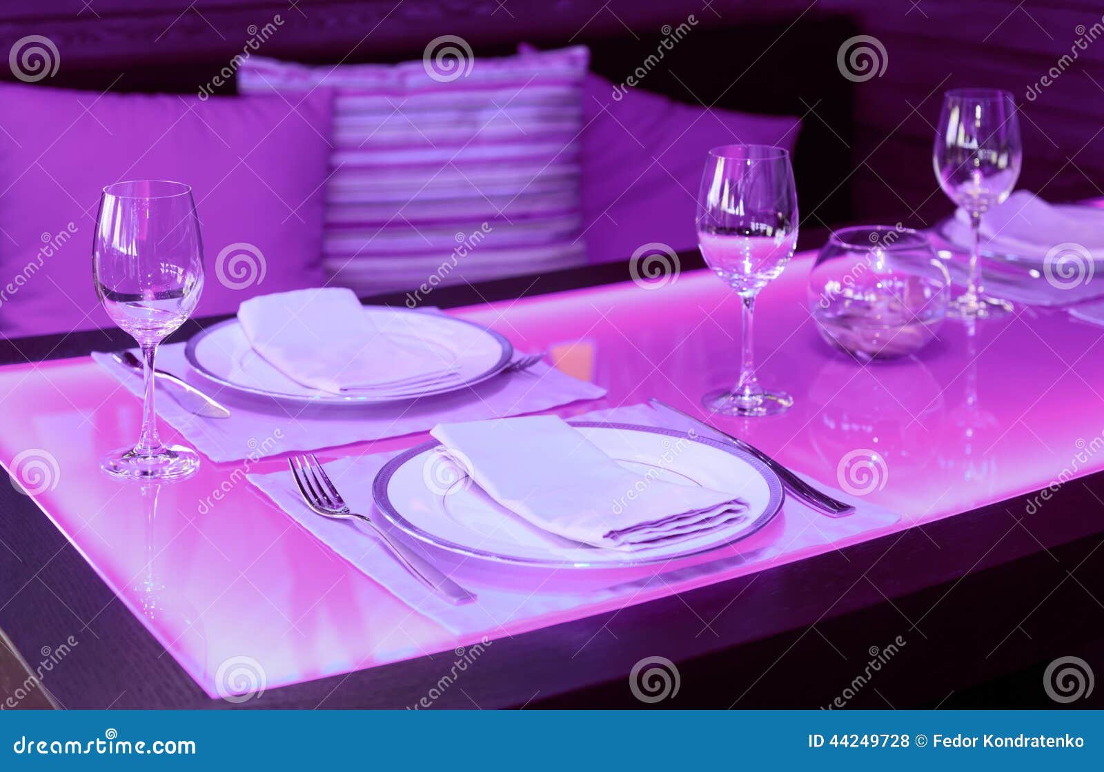 Glass Dining Table with Orange Backlight Stock Photo - Image of ...