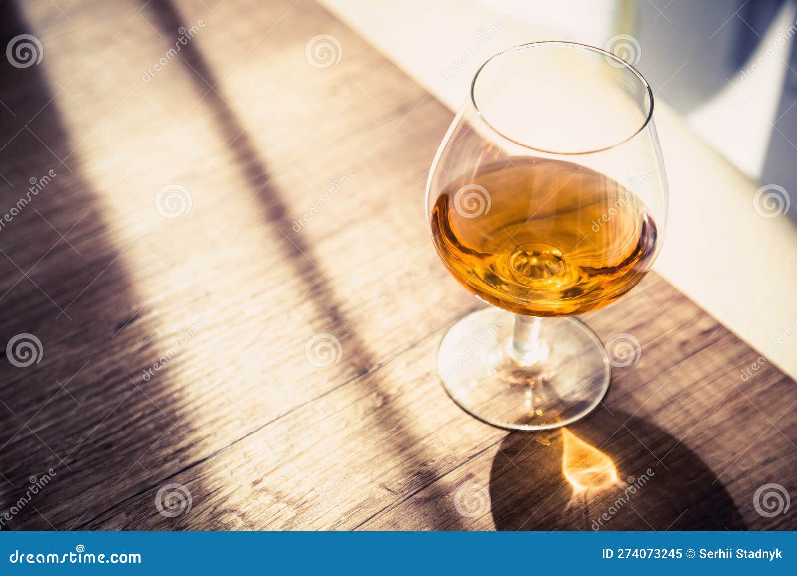 A Glass of Elite Cognac on the Bar Stock Image - Image of spirits ...