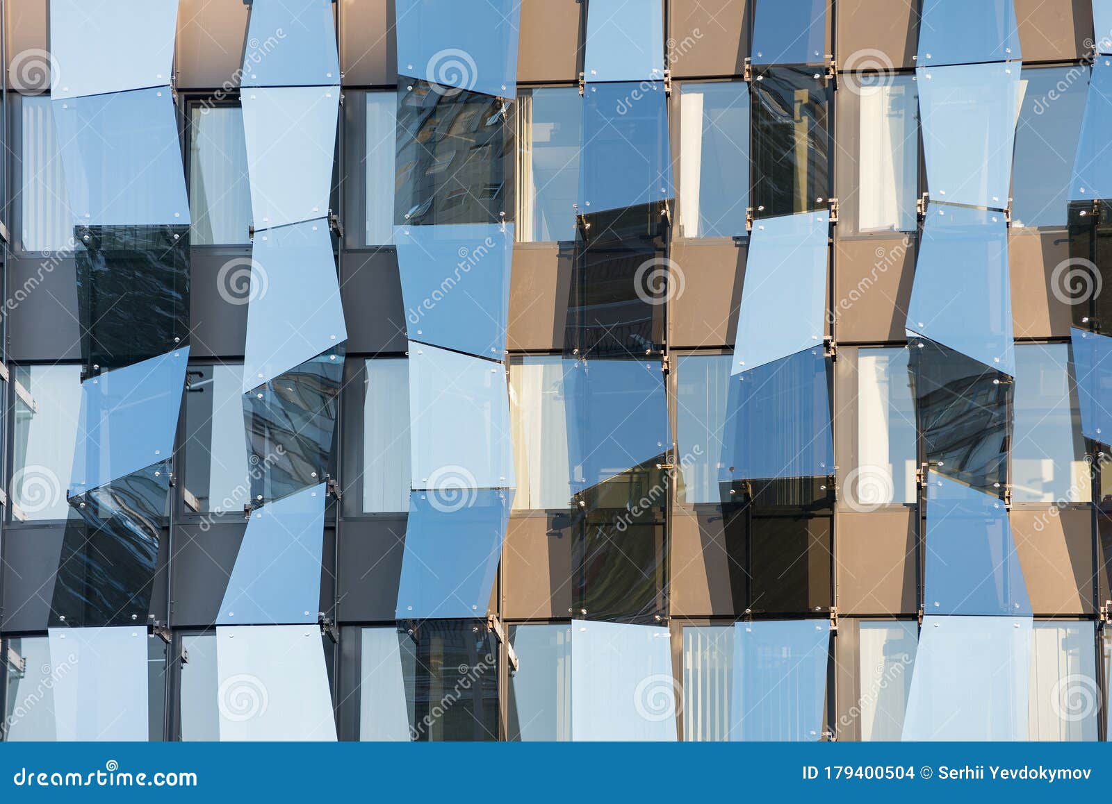 Glass Facade Buildings of Irregular Geometry. Modern Building in Hi ...