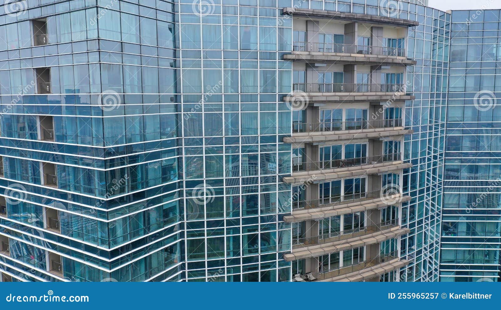 The Glass Facade of a Skyscraper with a Mirror Reflection of Sky ...