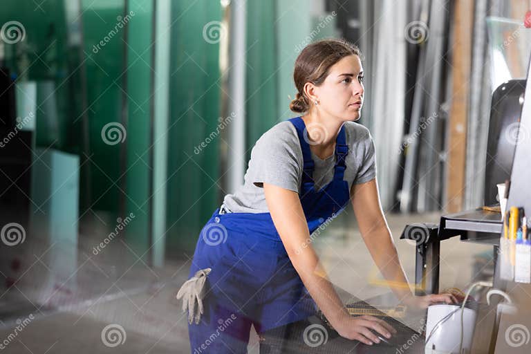 Glass Factory Worker at Workplace with Control Panel, Controlling ...