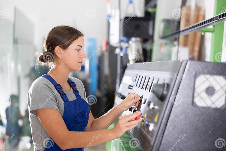 Glass Factory Worker at Workplace with Control Panel, Controlling ...