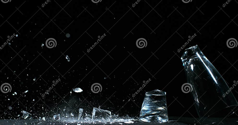 Glass Falling and Exploding on Black Background Stock Image - Image of ...