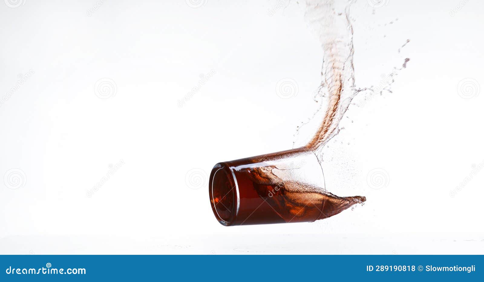 Glass Falling and Red Wine Splashing Against White Background Stock ...