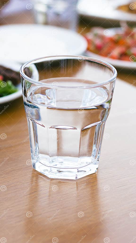 Glass Filled with Water on the Dining Table Stock Photo - Image of ...
