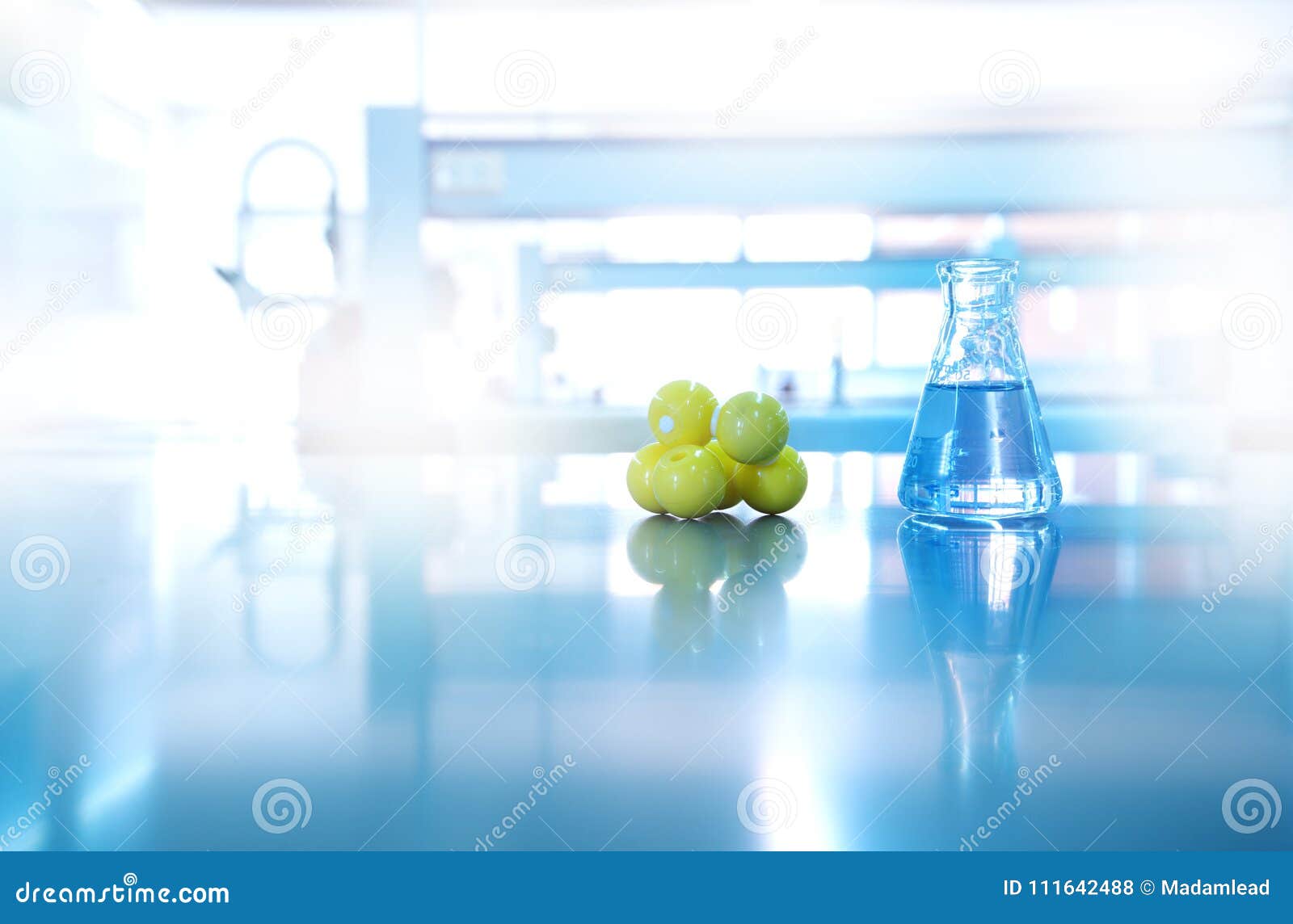 Glass Flask with Chemical Yellow Structure in Science Laboratory Stock ...