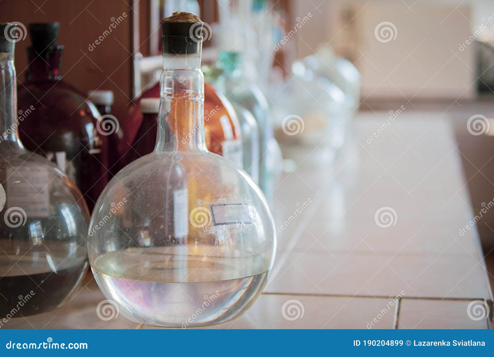 Glass Flasks on a Laboratory Table Stock Image - Image of flask ...