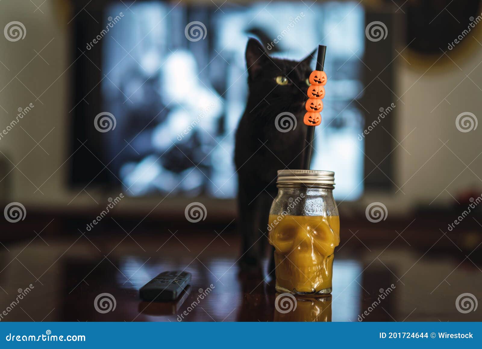 Glass of Fresh Juice and a Black Cat - Halloween Themed Stock Photo ...