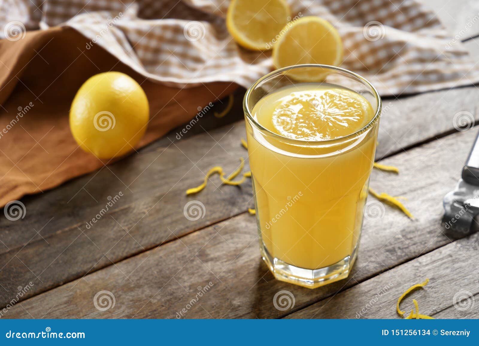 Glass of Fresh Lemon Juice on Wooden Table Stock Photo - Image of ...