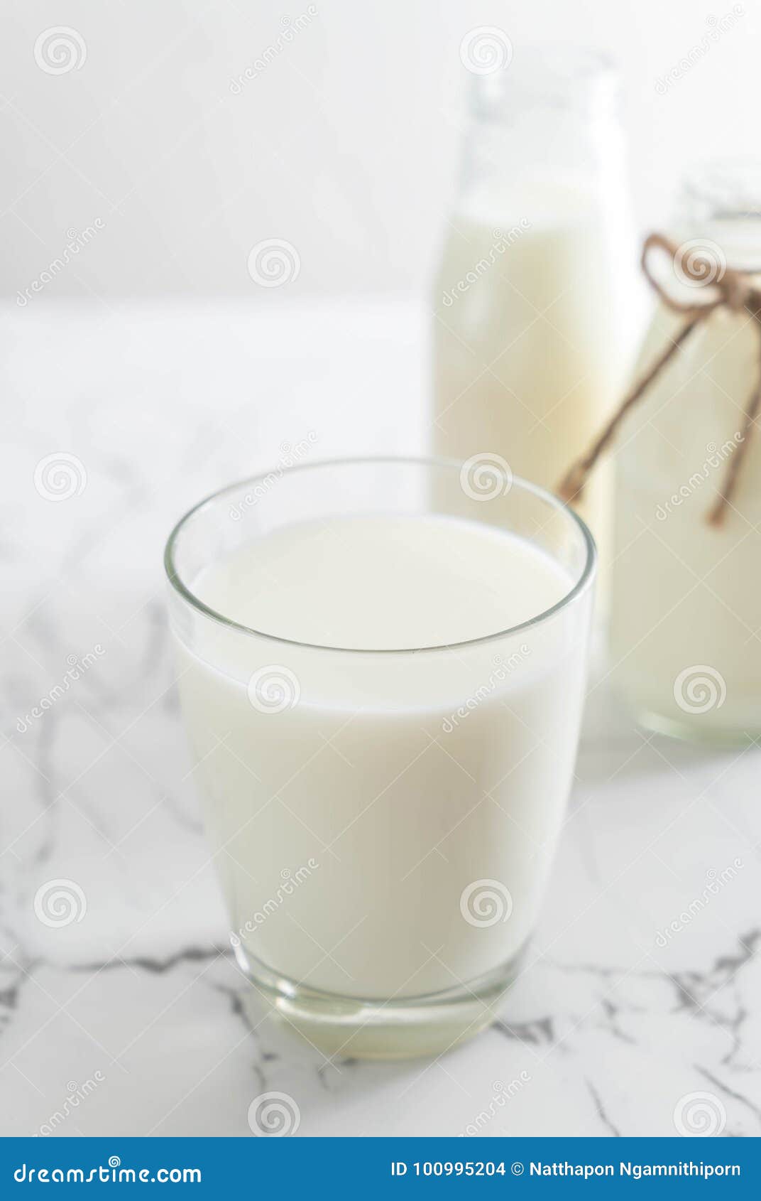 Glass of fresh milk stock photo. Image of food, pour - 100995204