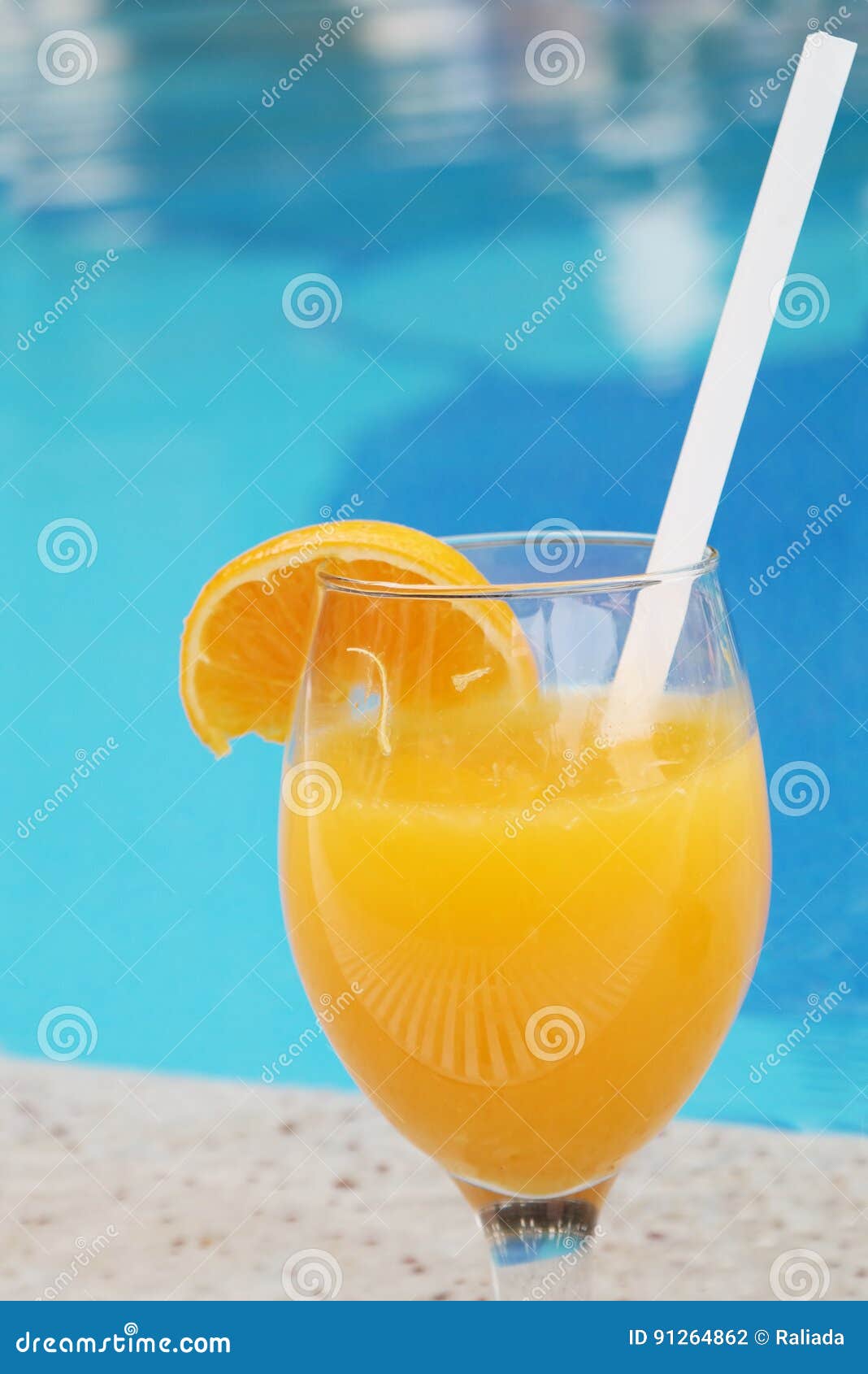 Glass of Fresh Orange Juice Near the Pool Stock Photo - Image of water ...