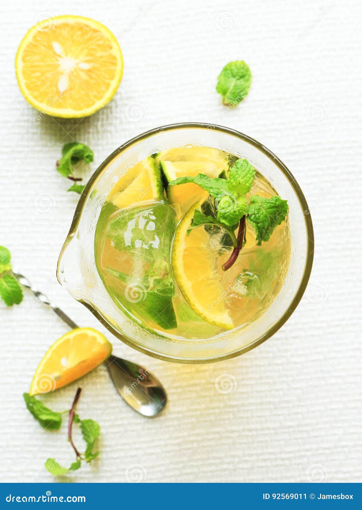 Glass of Fresh Orange Tea with Mint Leaf on White Background Stock ...
