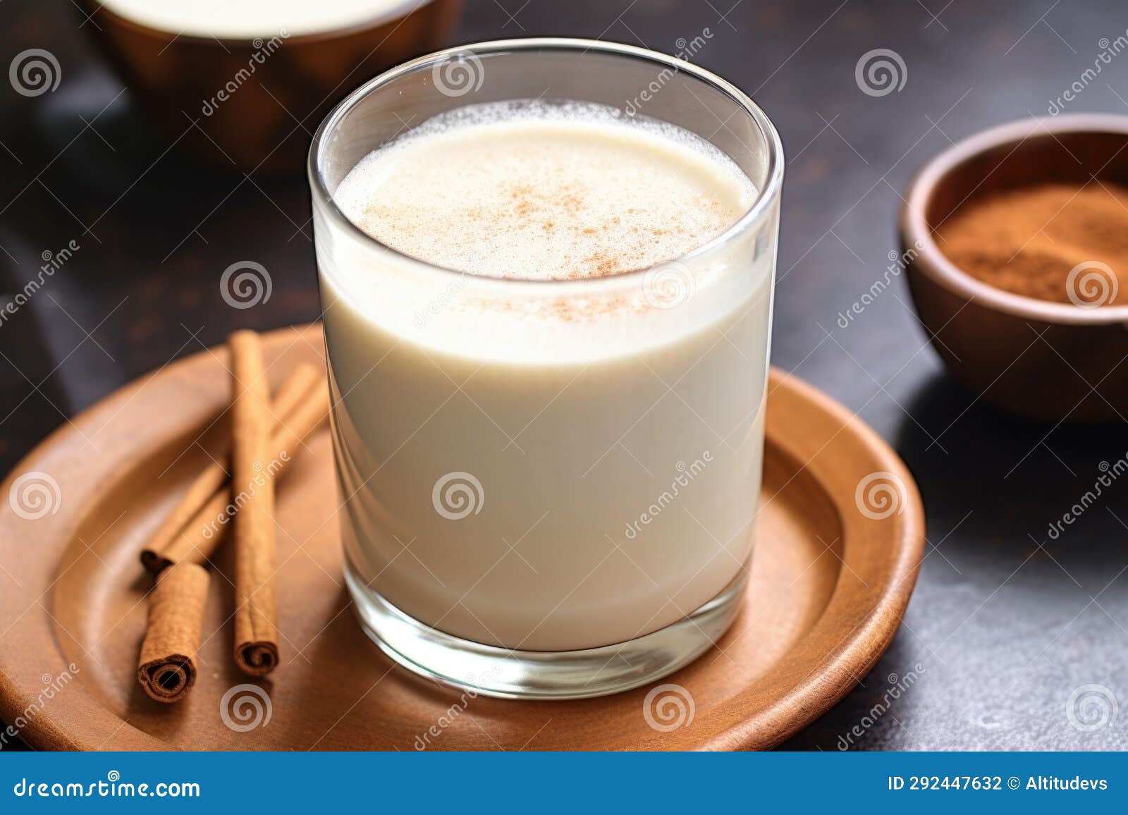 Glass of Frothy Horchata with a Spoon in the Background Stock Photo ...