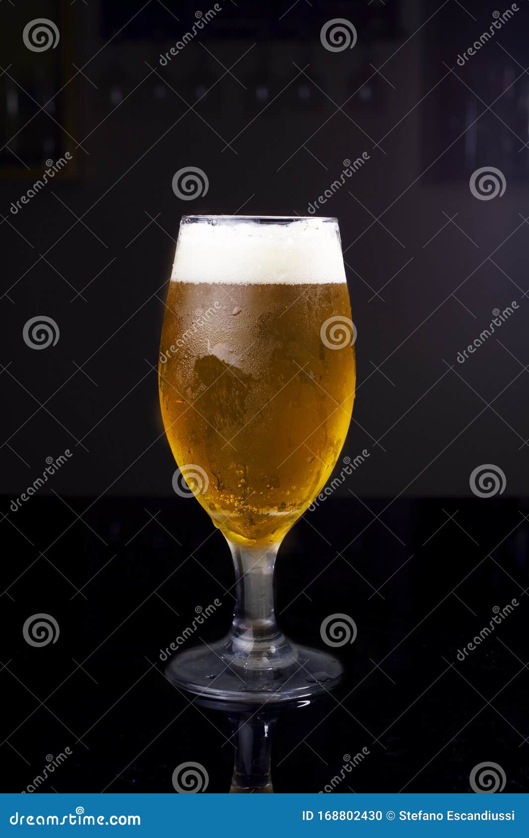 Glass Full of Beer, with Chopp Pilsen on a Dark Background in a Pub ...