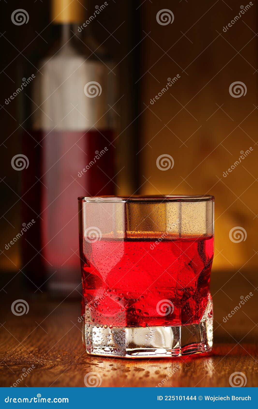 A Glass Full of Colored Vodka Stock Photo - Image of glass, drops ...