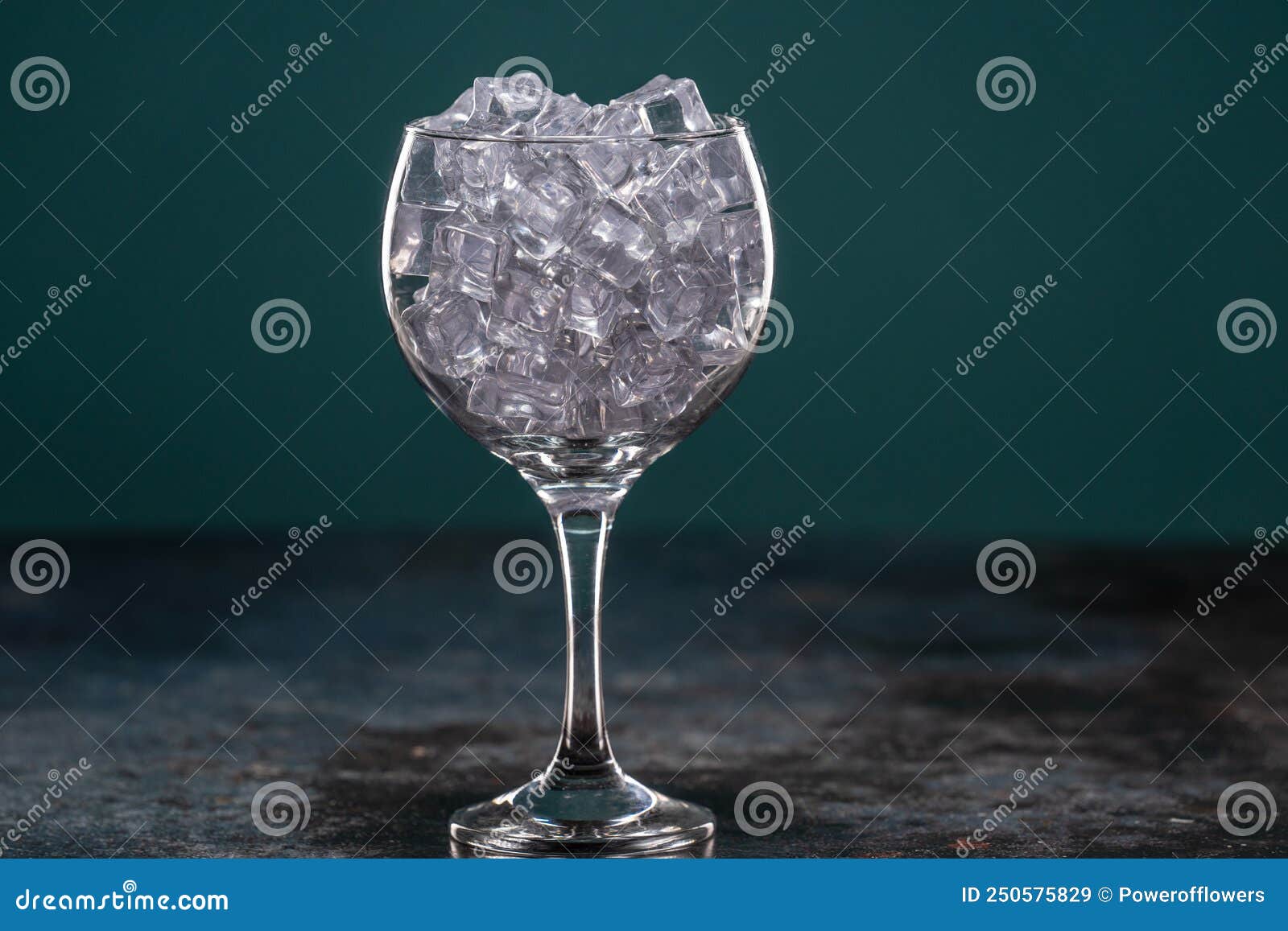 Glass Full of Ice Standing on a Table in the Dark Stock Image - Image ...