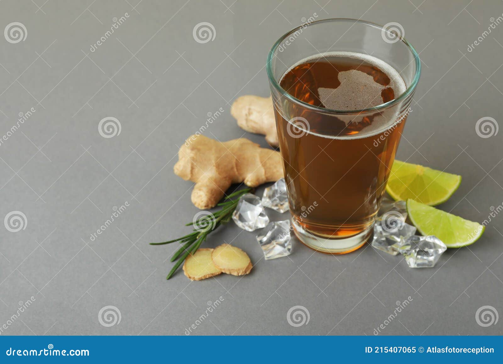 Glass of Ginger Beer and Ingredients on Gray Background Stock Image ...
