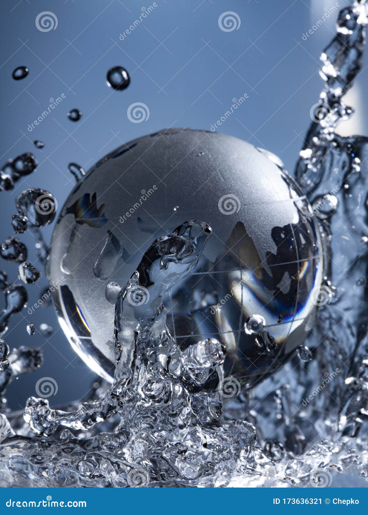 Glass Globe Planet in Drop Water Splash on Blue Background Stock Image ...