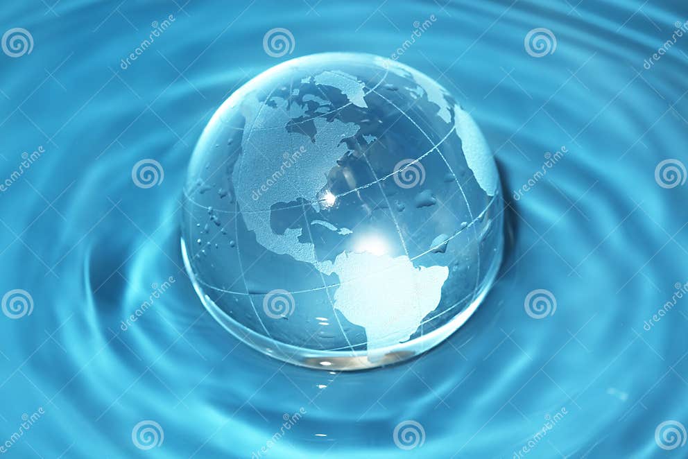 Glass globe in water stock photo. Image of earth, sphere - 19600926